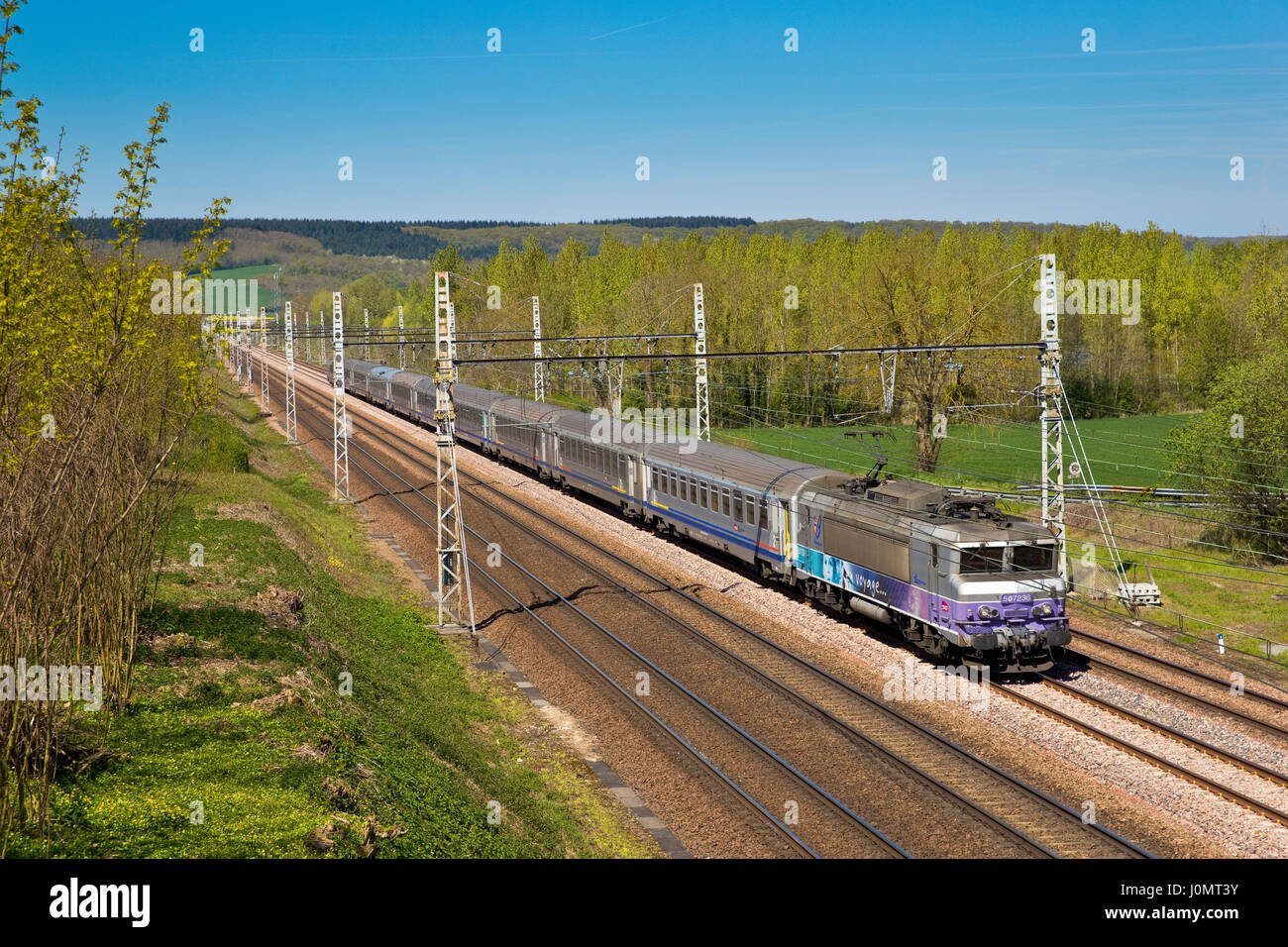 Passenger Train SNCF crossing Burgundy Stock Photo - Alamy
