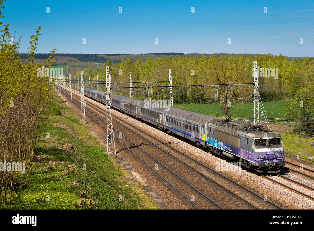Passenger Train SNCF crossing Burgundy Stock Photo - Alamy