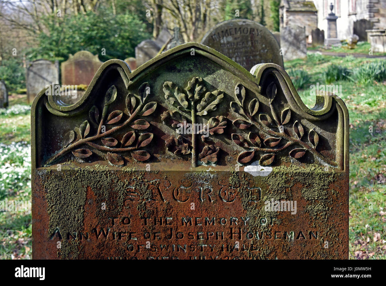 Detail of gravestone with foliage design.Church of Saint Michael and ...