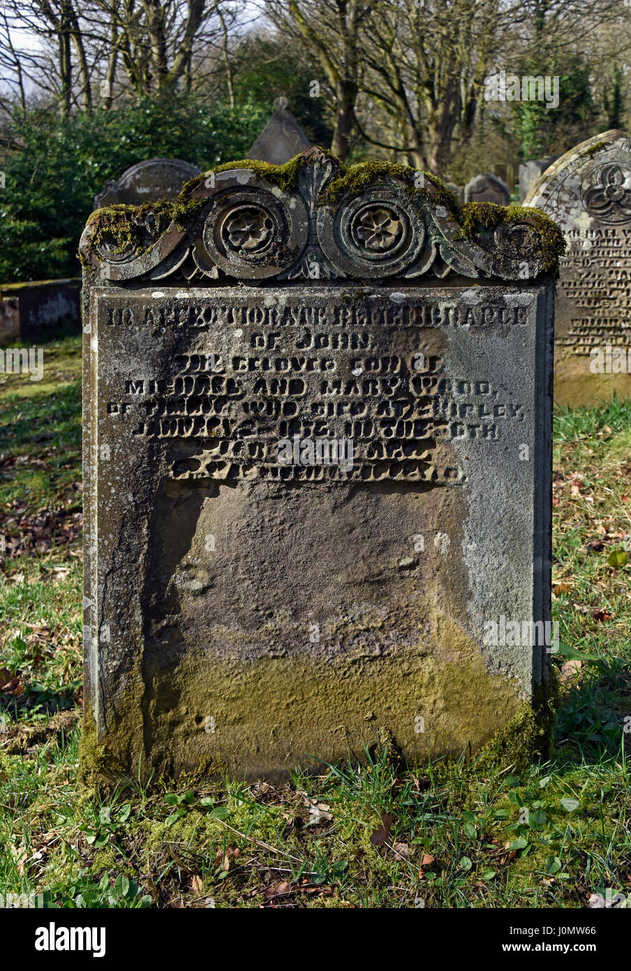 Badly eroded gravestone. Church of Saint Michael and Saint Lawrence ...