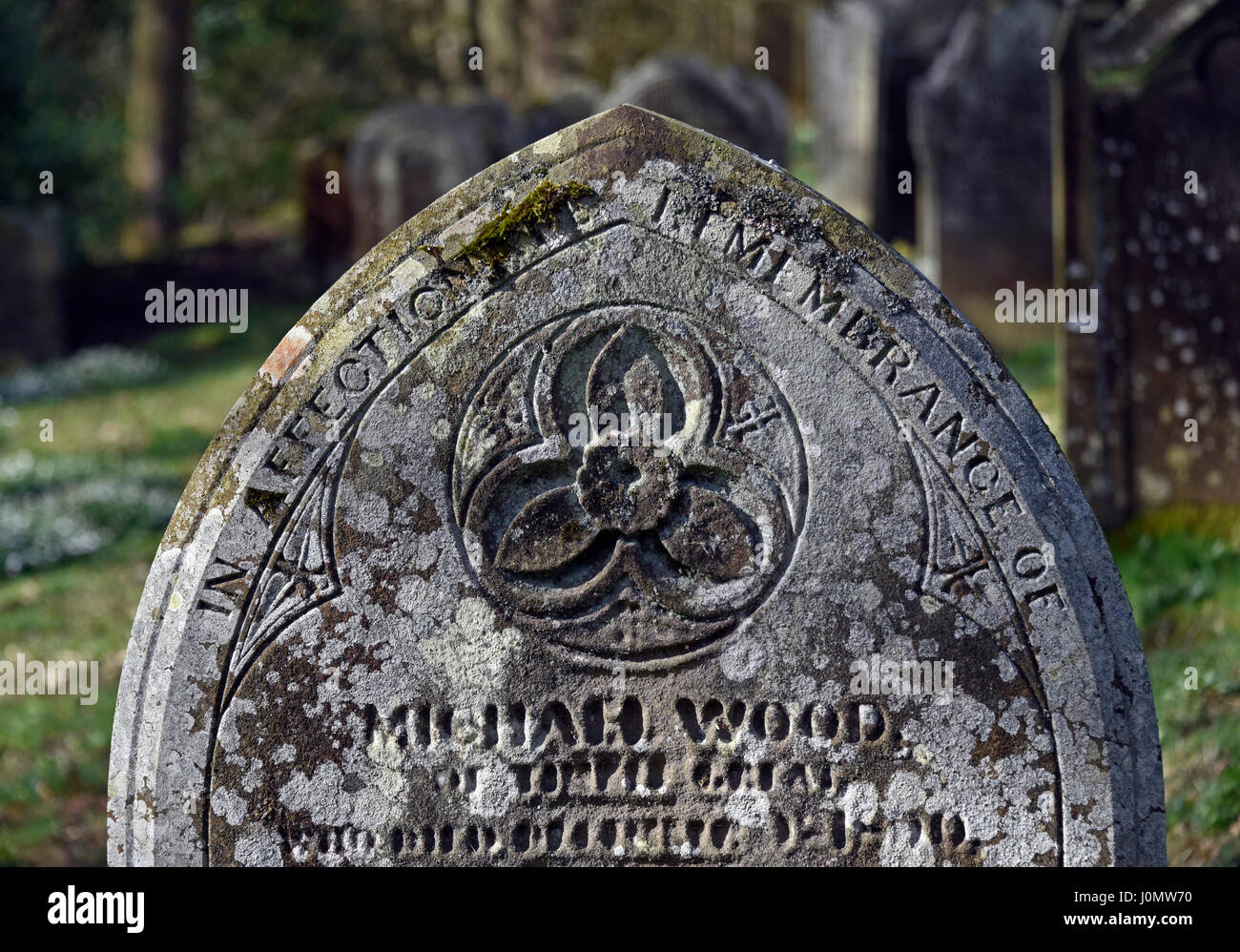 Badly eroded gravestone. Church of Saint Michael and Saint Lawrence ...