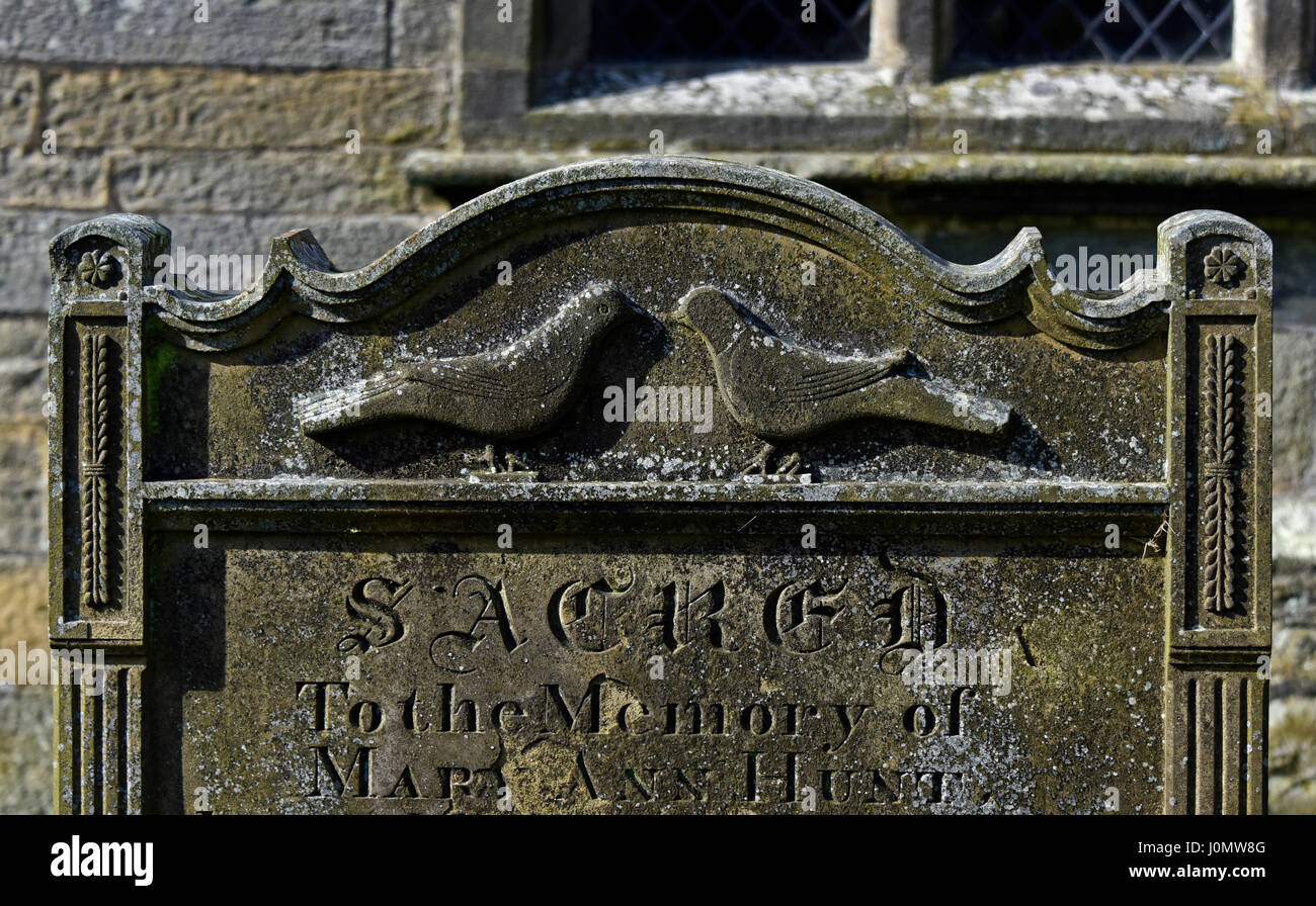 Detail of gravestone with two doves motif. Church of Saint Michael and ...