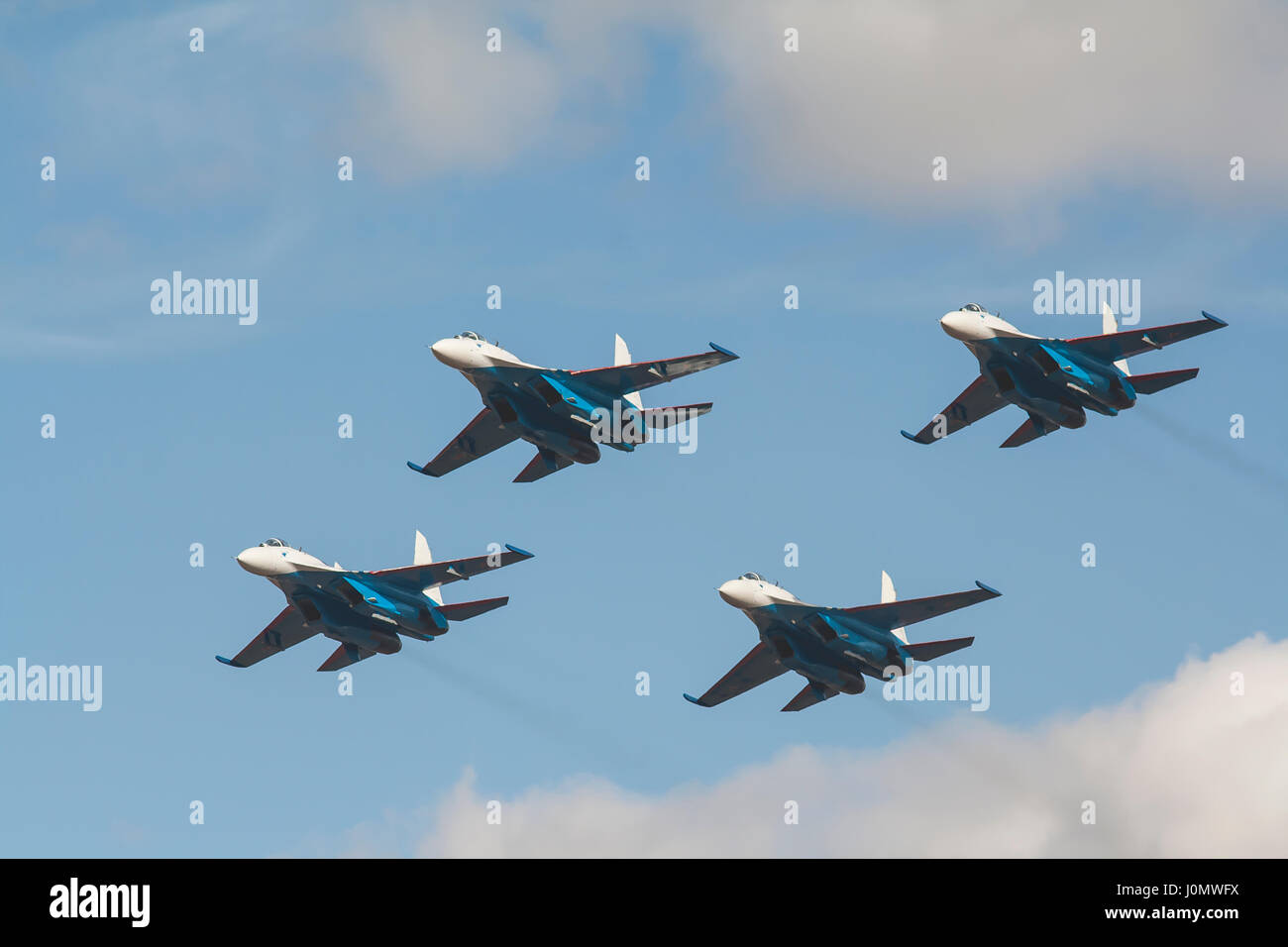four russian fighters su-27 in flight Stock Photo - Alamy