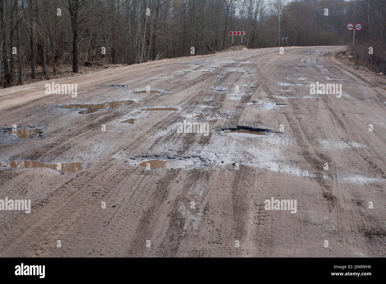 Puddle in pit asphalt road hi-res stock photography and images - Alamy