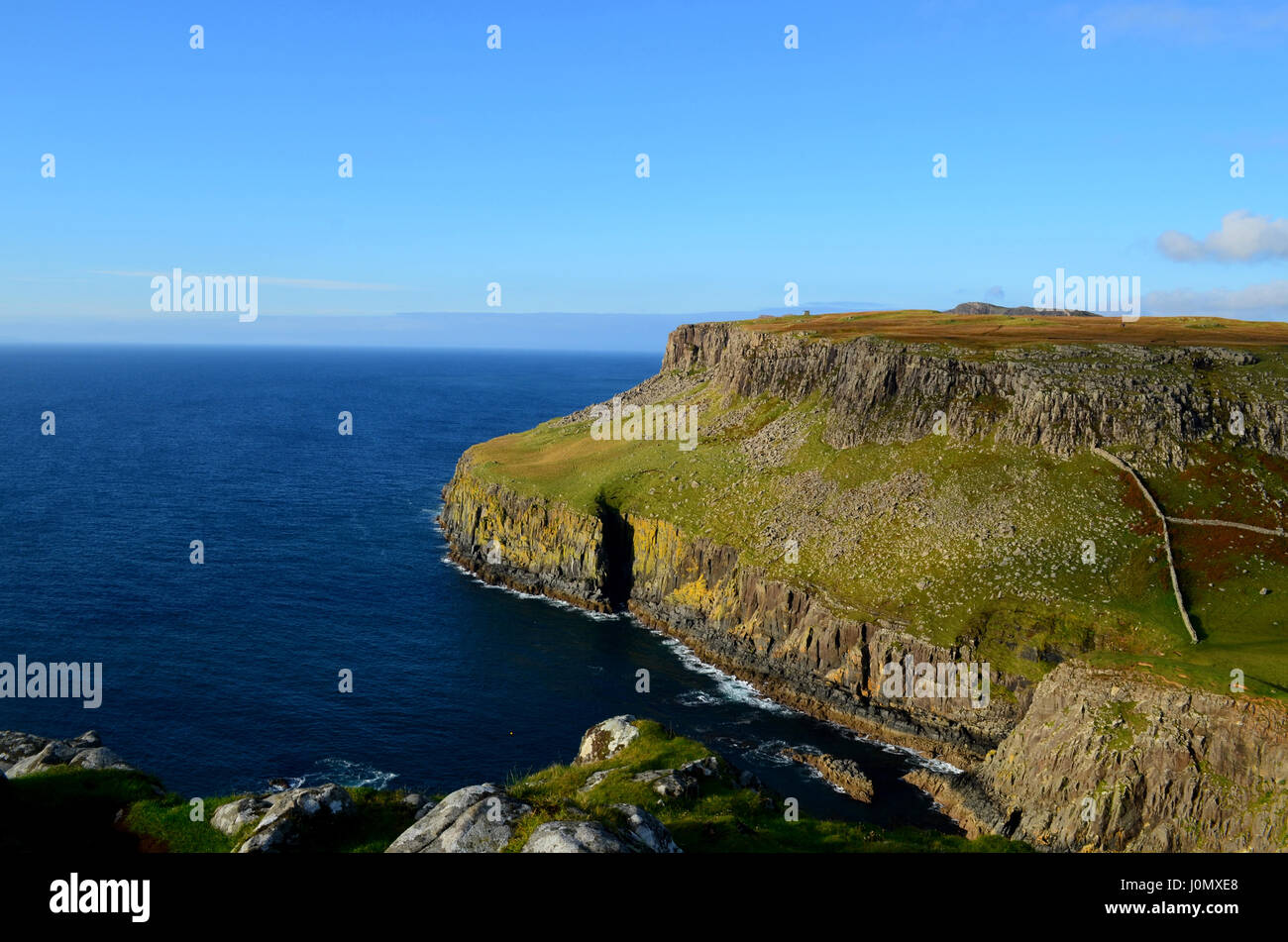 The Scottish Highlands with amazing sea cliffs, moors and rolling hills ...