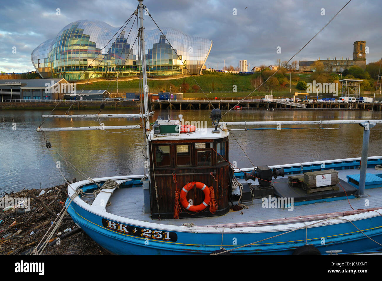 sage reflections with fishing boat Stock Photo - Alamy