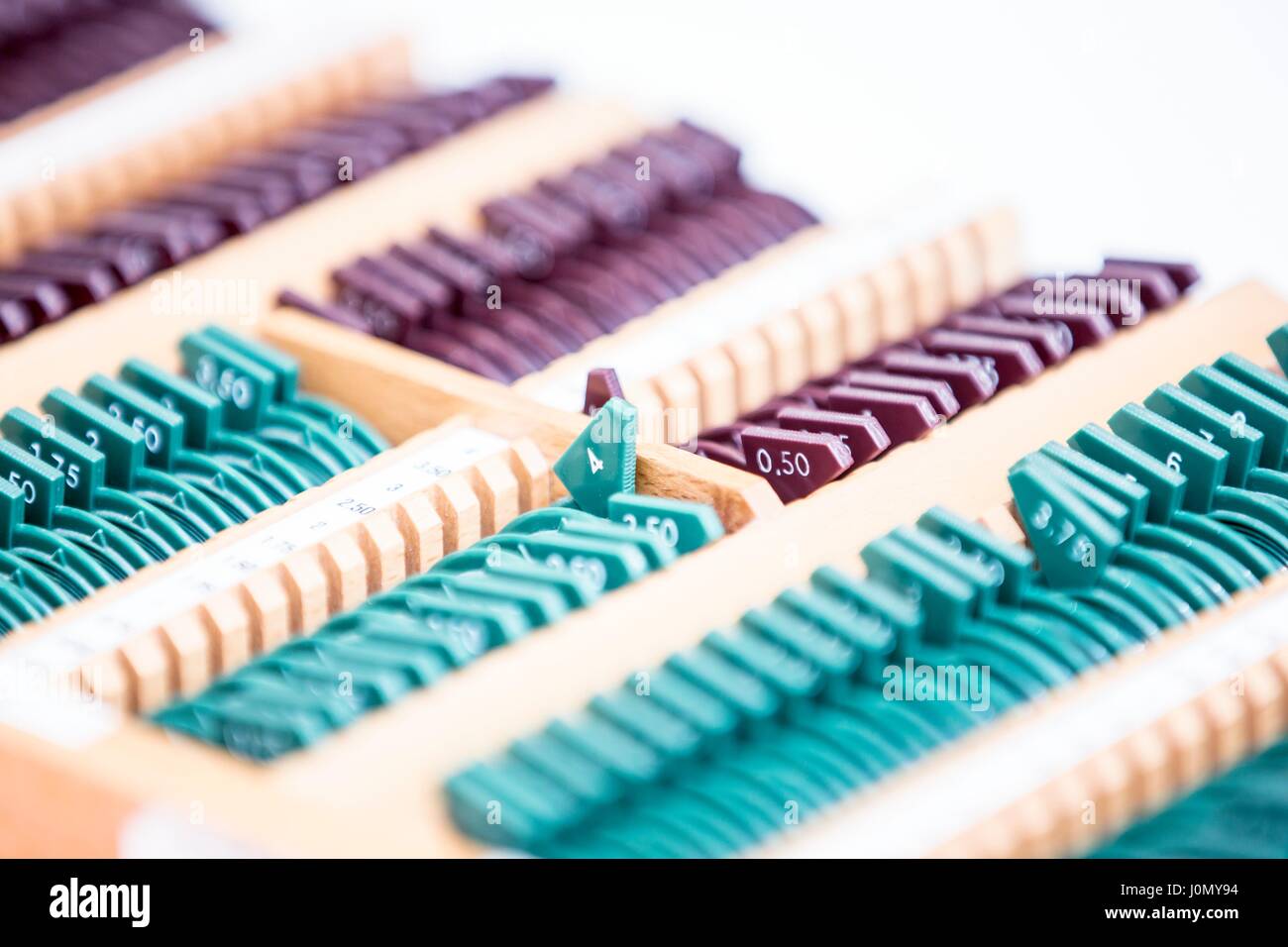 Close-up of lenses in rack, used for eye test Stock Photo - Alamy