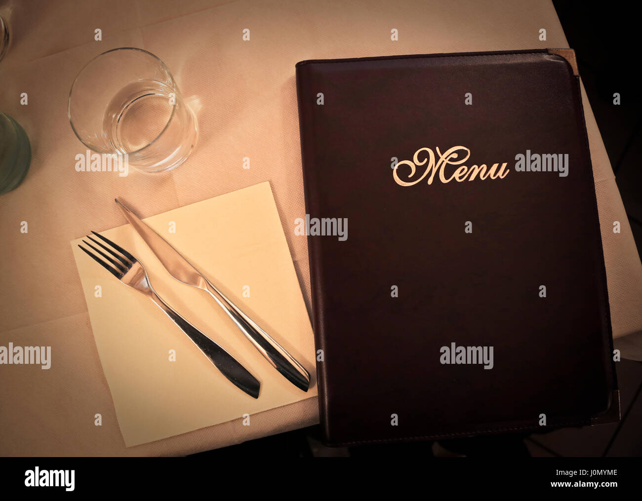 Menu on restaurant's table Stock Photo - Alamy