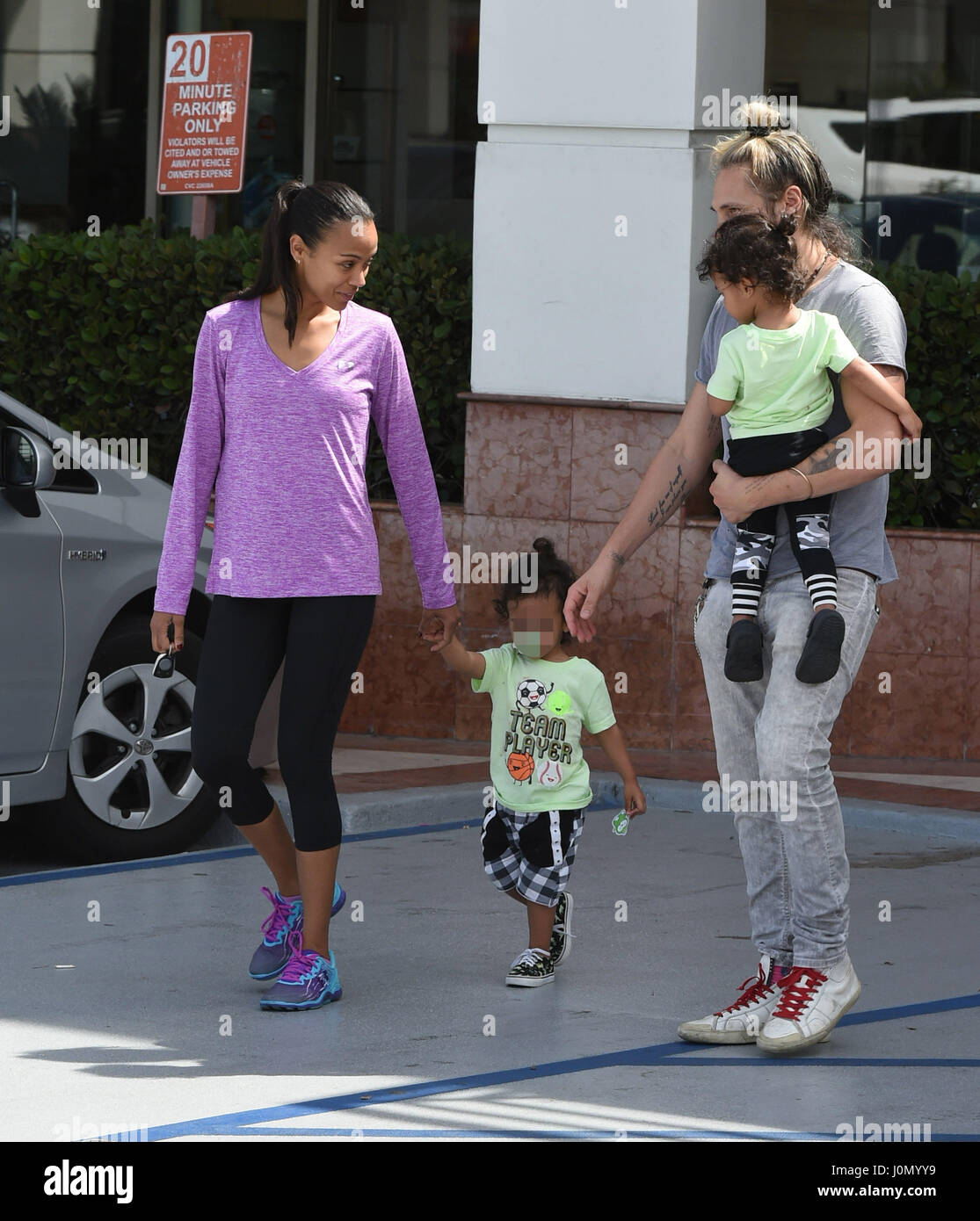 Zoe Saldana goes to Yogurtland with her family Featuring: Zoe Saldana ...