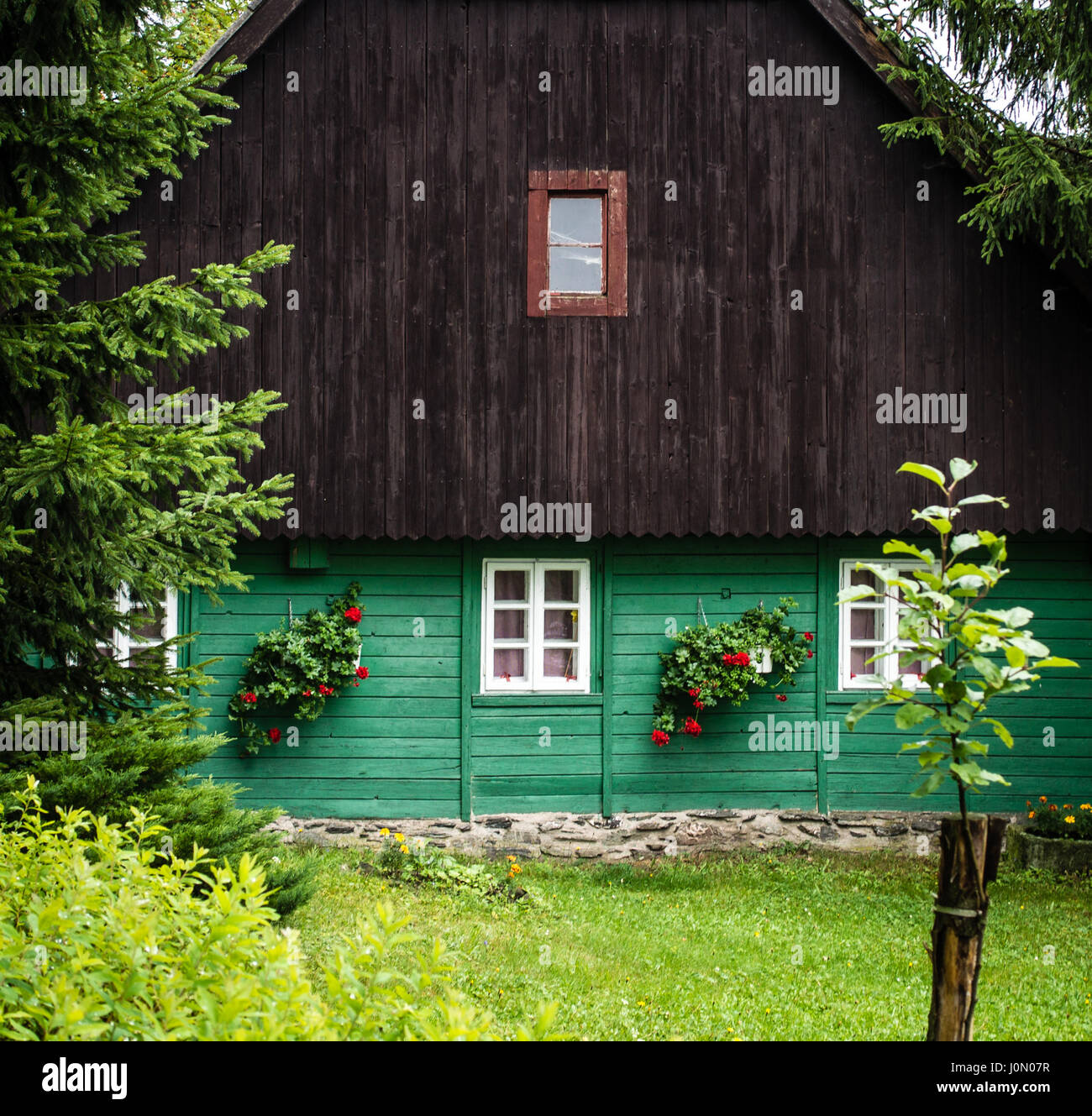 Detail of traditional mountain chalet, cottage or hut made of wood ...