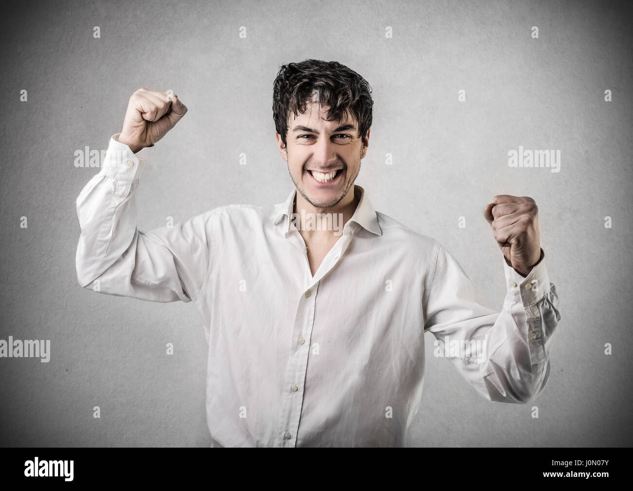 Man being successful and happy Stock Photo - Alamy