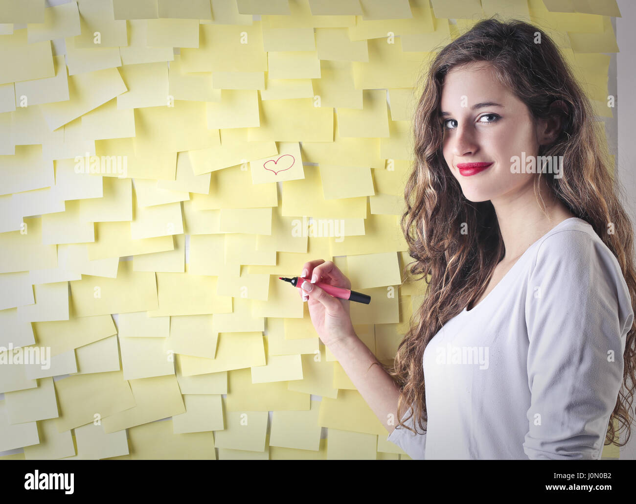 Woman with post-it wall Stock Photo - Alamy