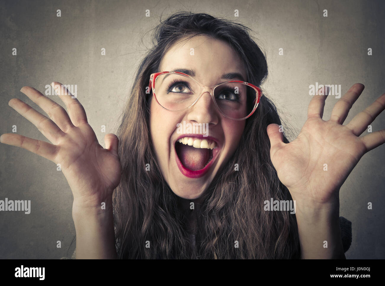 Happy woman feeling great Stock Photo - Alamy