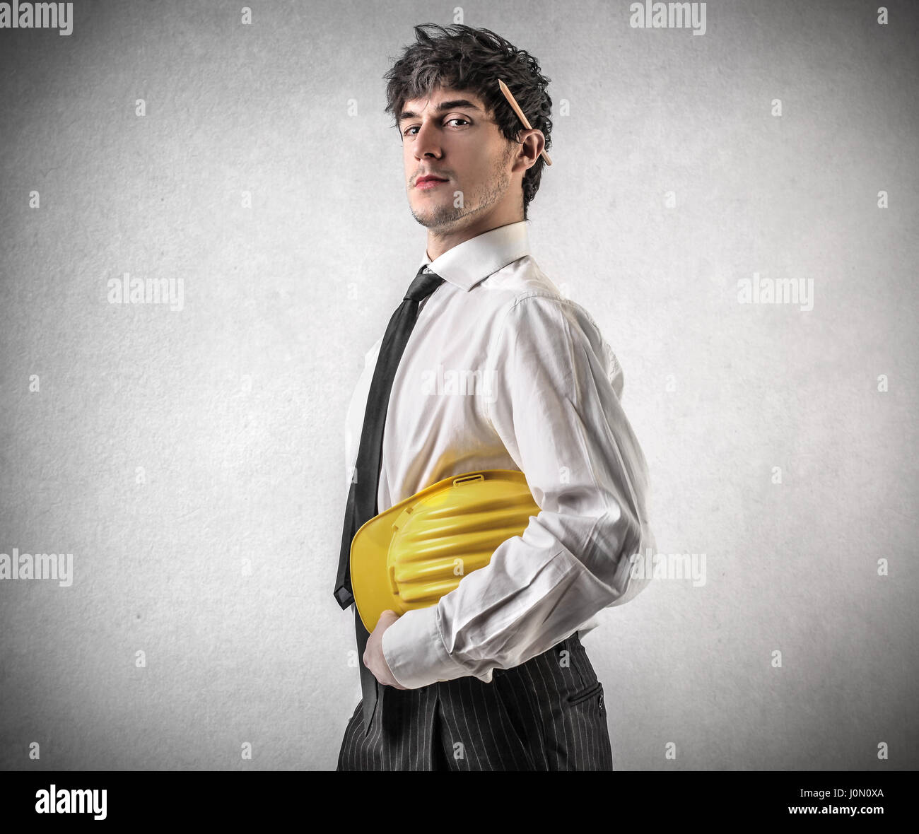 Confident construction worker Stock Photo - Alamy