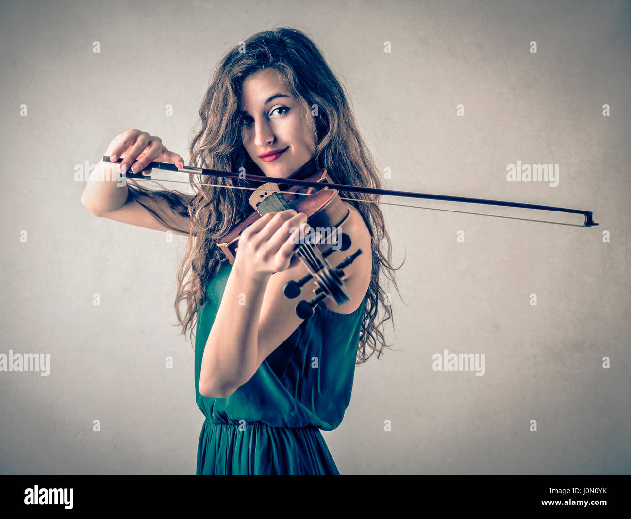 Woman playing violin on white hi-res stock photography and images - Alamy