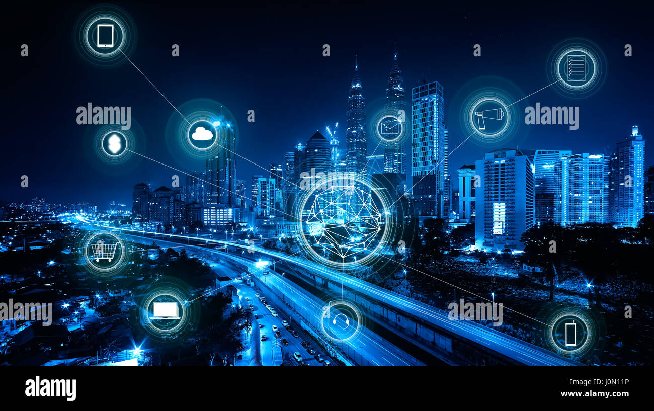 Kuala Lumpur city skyline at night with network connection concept ...