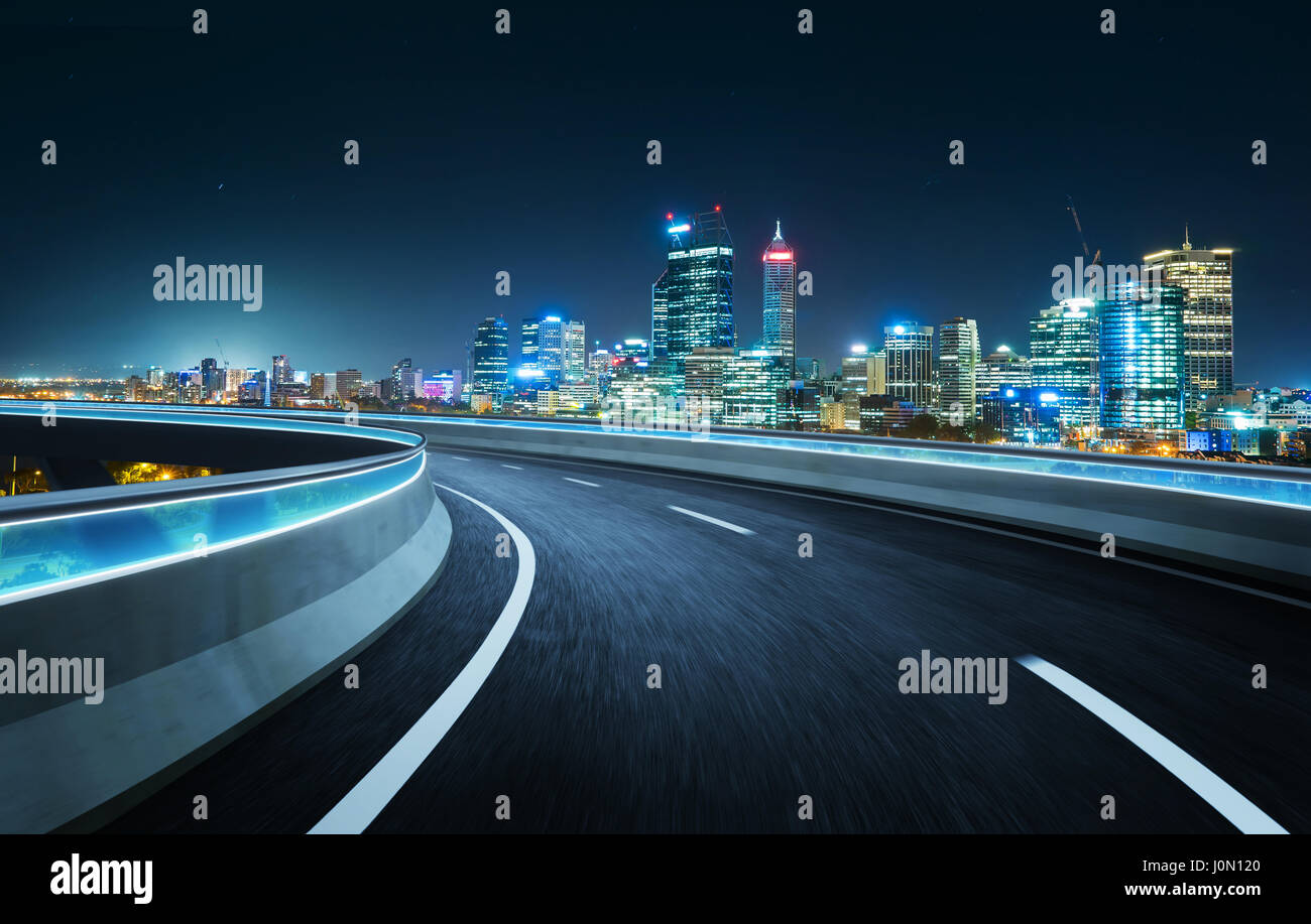 Highway overpass modern city skyline background . Night scene Stock ...
