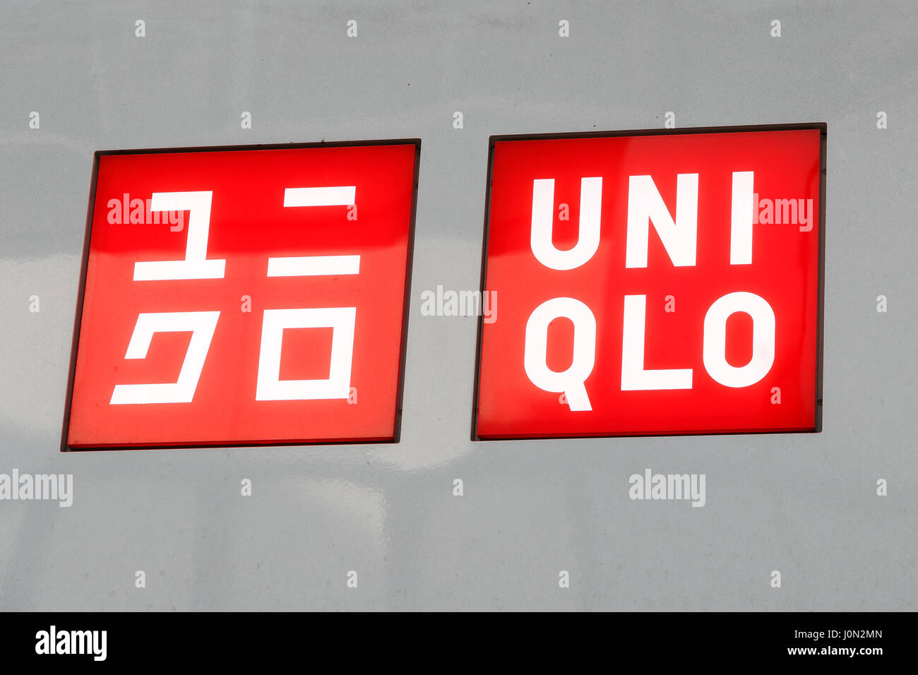Tokyo, Japan. 14th April, 2017. An Uniqlo signboard on display outside ...