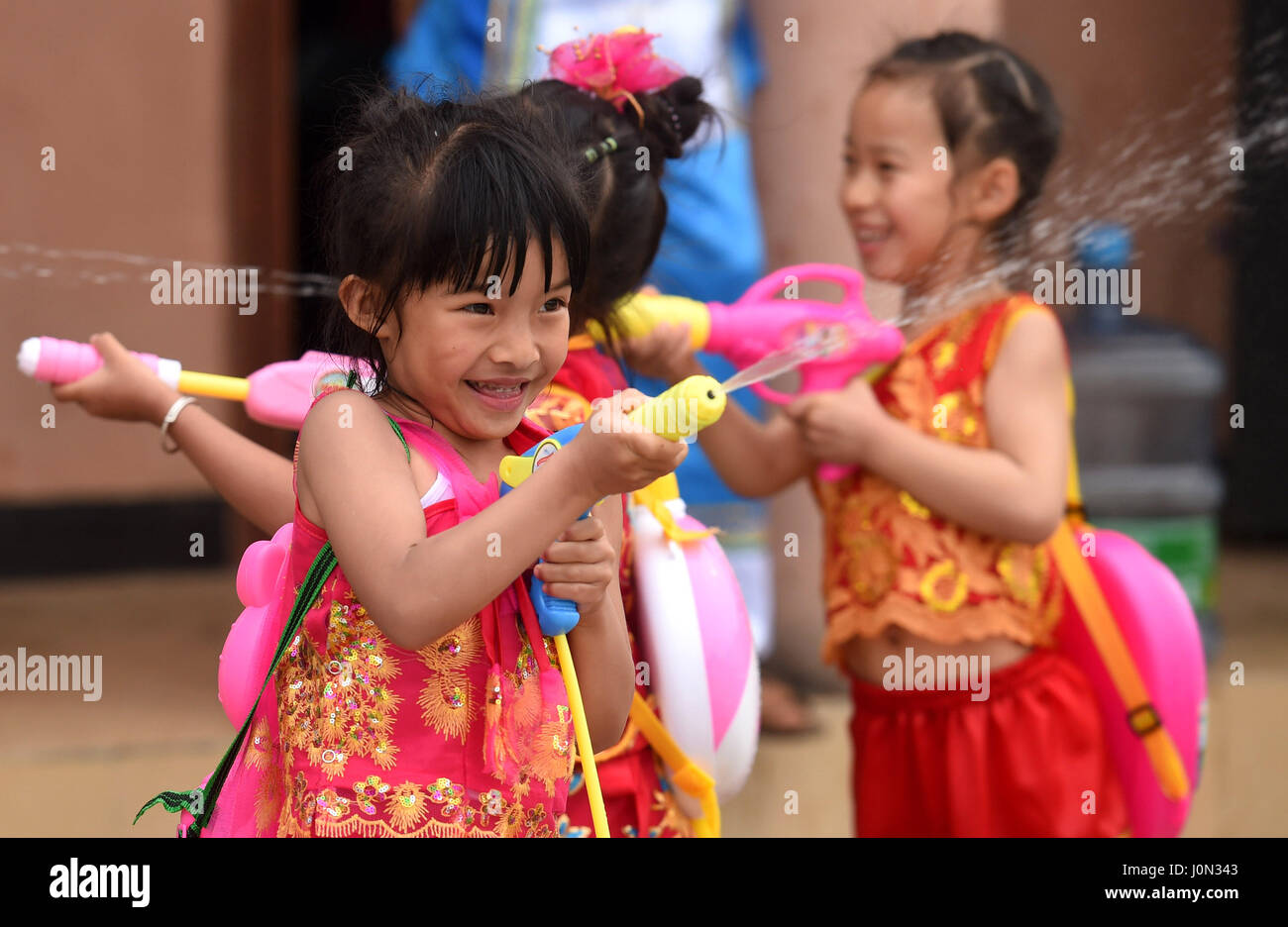Jinggu, China's Yunnan Province. 14th Apr, 2017. Children of local Dai ...
