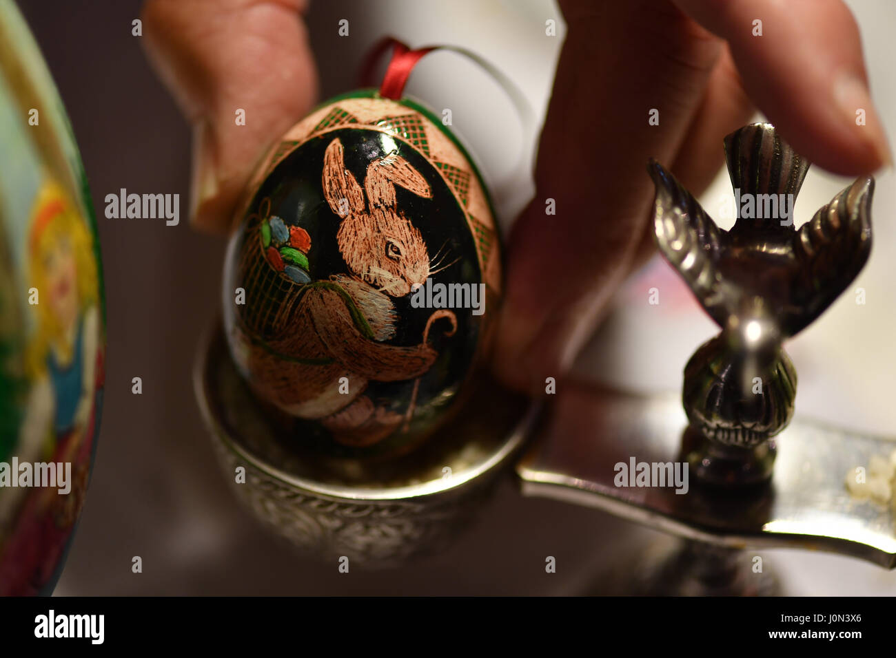 Artfully painted Easter eggs by artist Maria Hoffmueller are on display ...