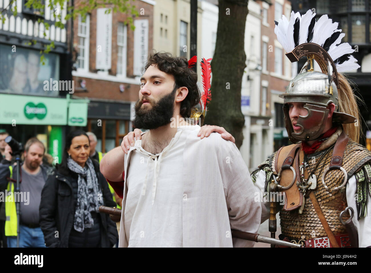 Chester, UK. 14th Apr, 2017. A Roman Soldier marching Jesus through ...