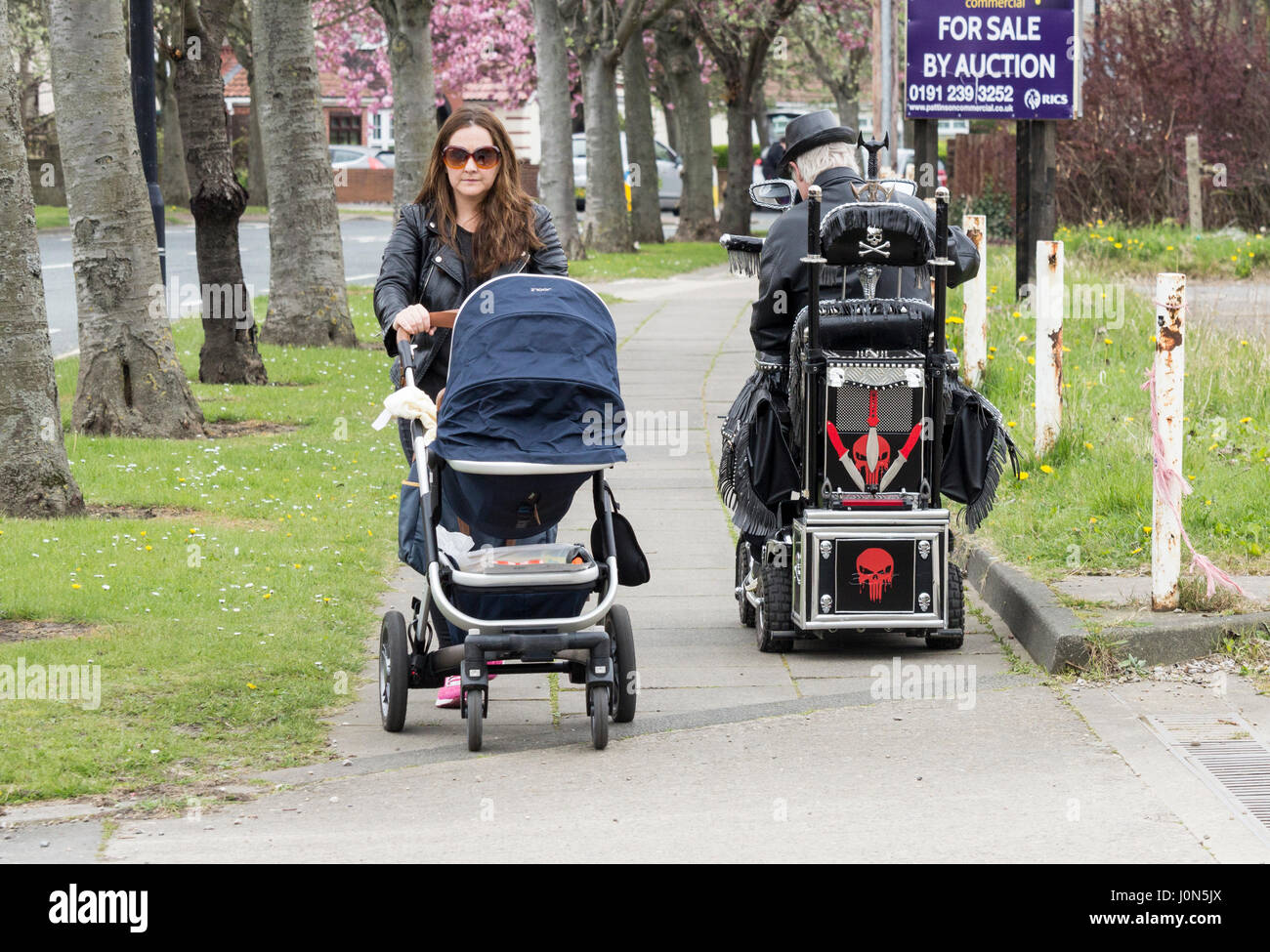 Goth riding mobility scooter hi-res stock photography and images - Alamy