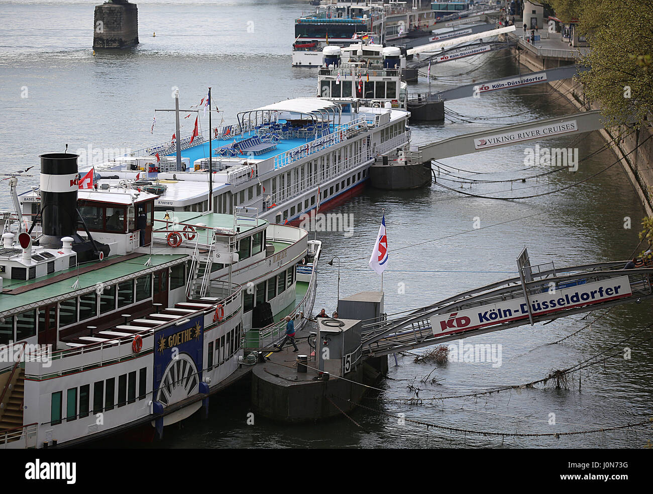 Cologne, Germany. 12th Apr, 2017. Passenger ships on the Rhine River in ...