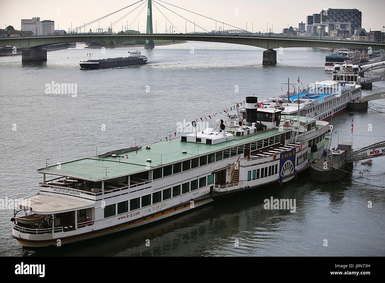Cologne, Germany. 12th Apr, 2017. Passenger ships on the Rhine River in ...