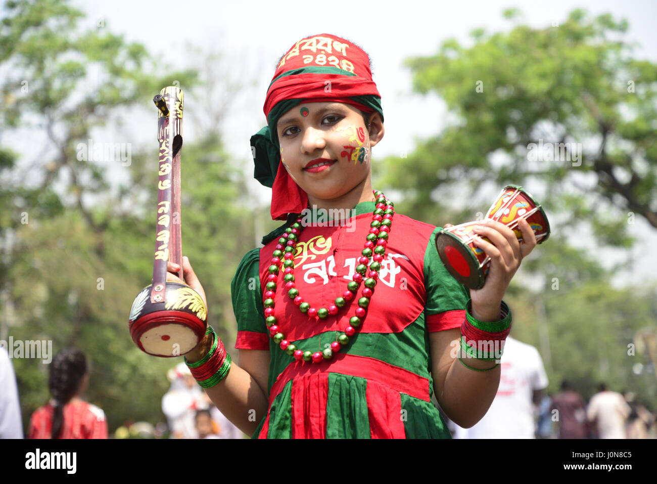 Bangladeshi people participate in a parade to celebrate the first day ...