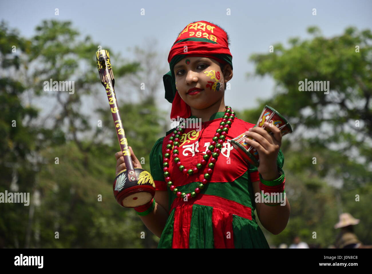 Bangladeshi people participate in a parade to celebrate the first day ...