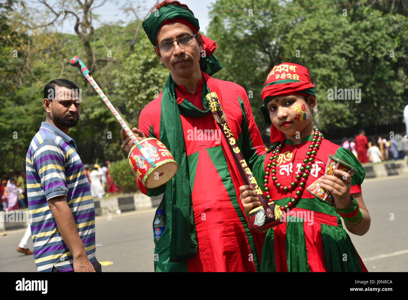 Bangladeshi people participate in a parade to celebrate the first day ...