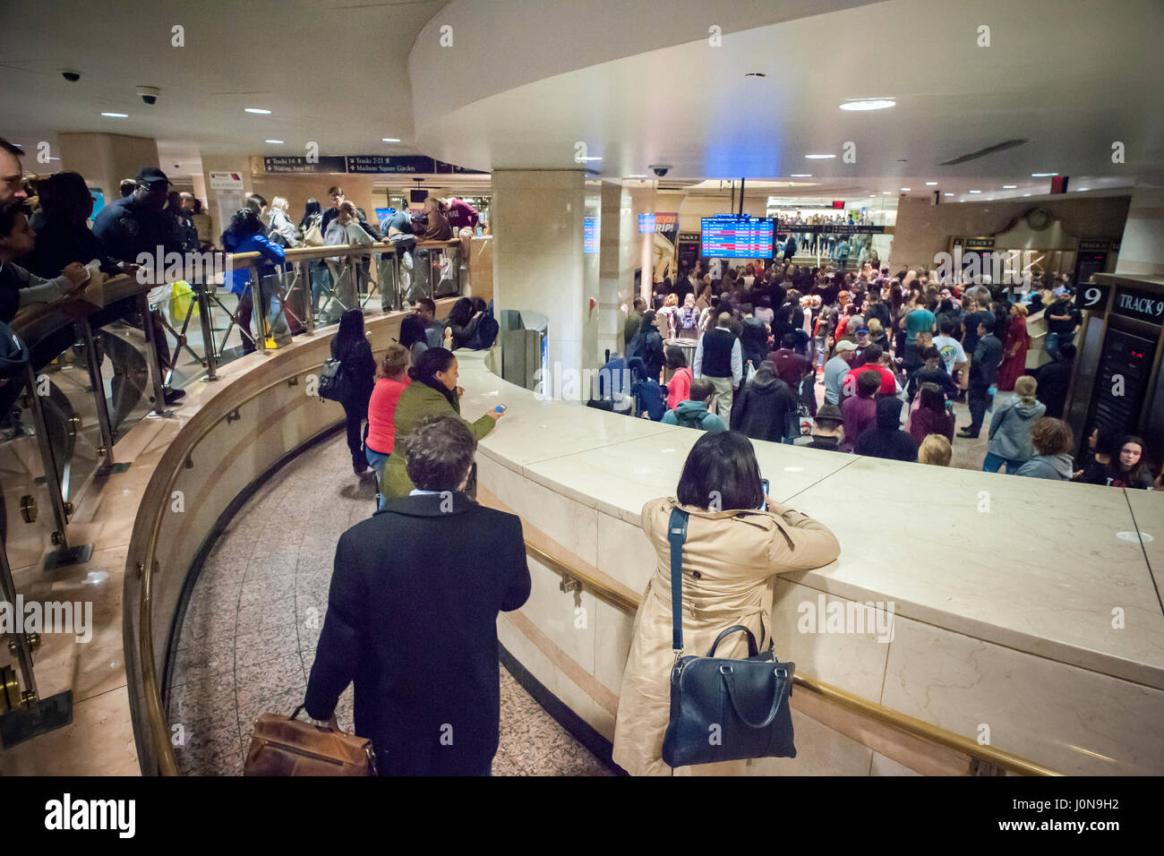 New York, USA. 14th Apr, 2017. Hundreds of people pack the NJ Transit ...
