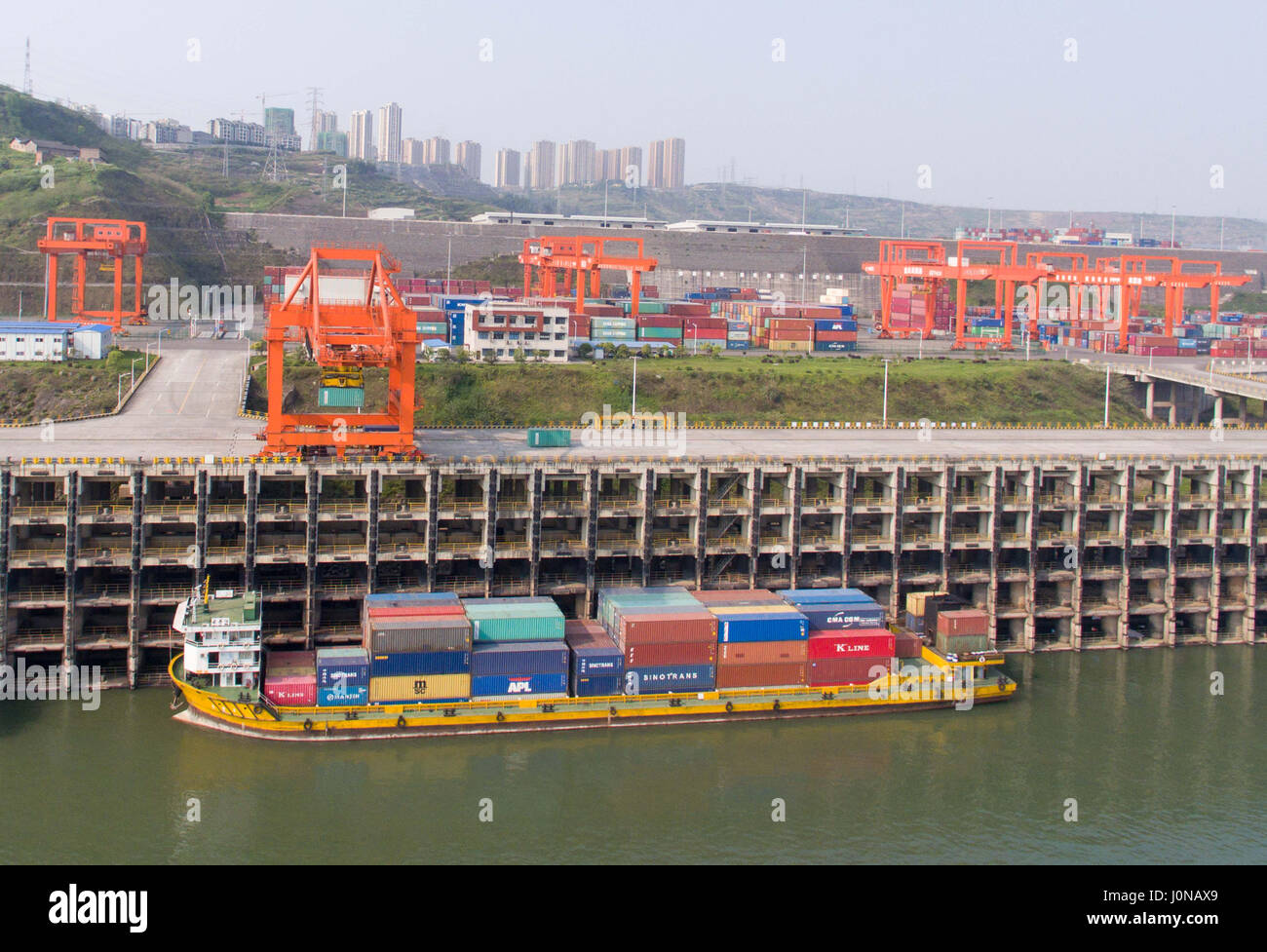 Chongqing, China. 14th Apr, 2017. A freighter sails at Guoyuan port on ...