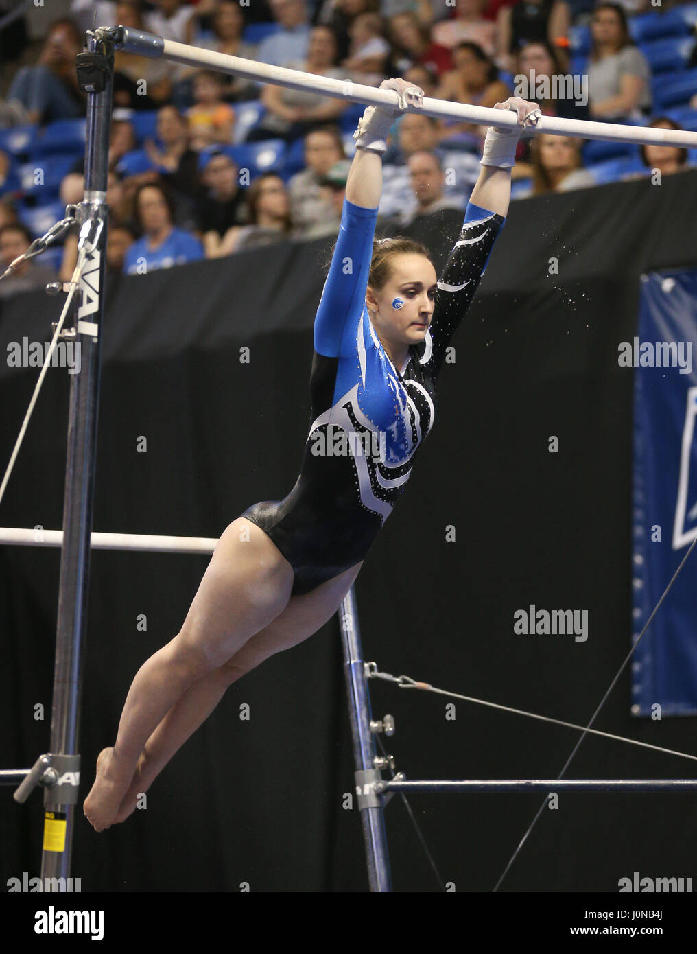St. 14th Apr, 2017. Boise State's Shani Remme swings from the uneven ...