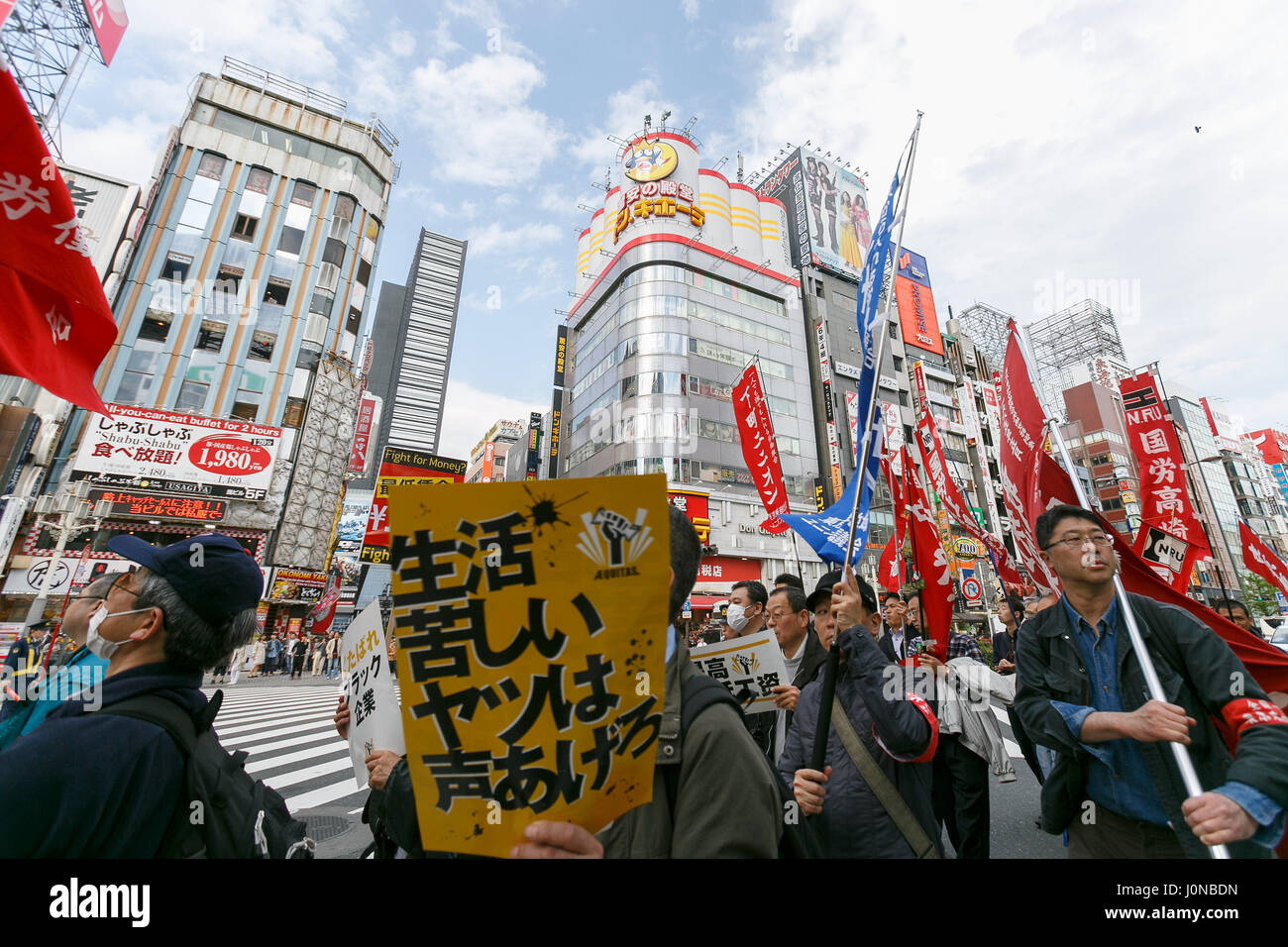 Tokyo, Japan. 15th April, 2017. Protesters hold placards demanding ...