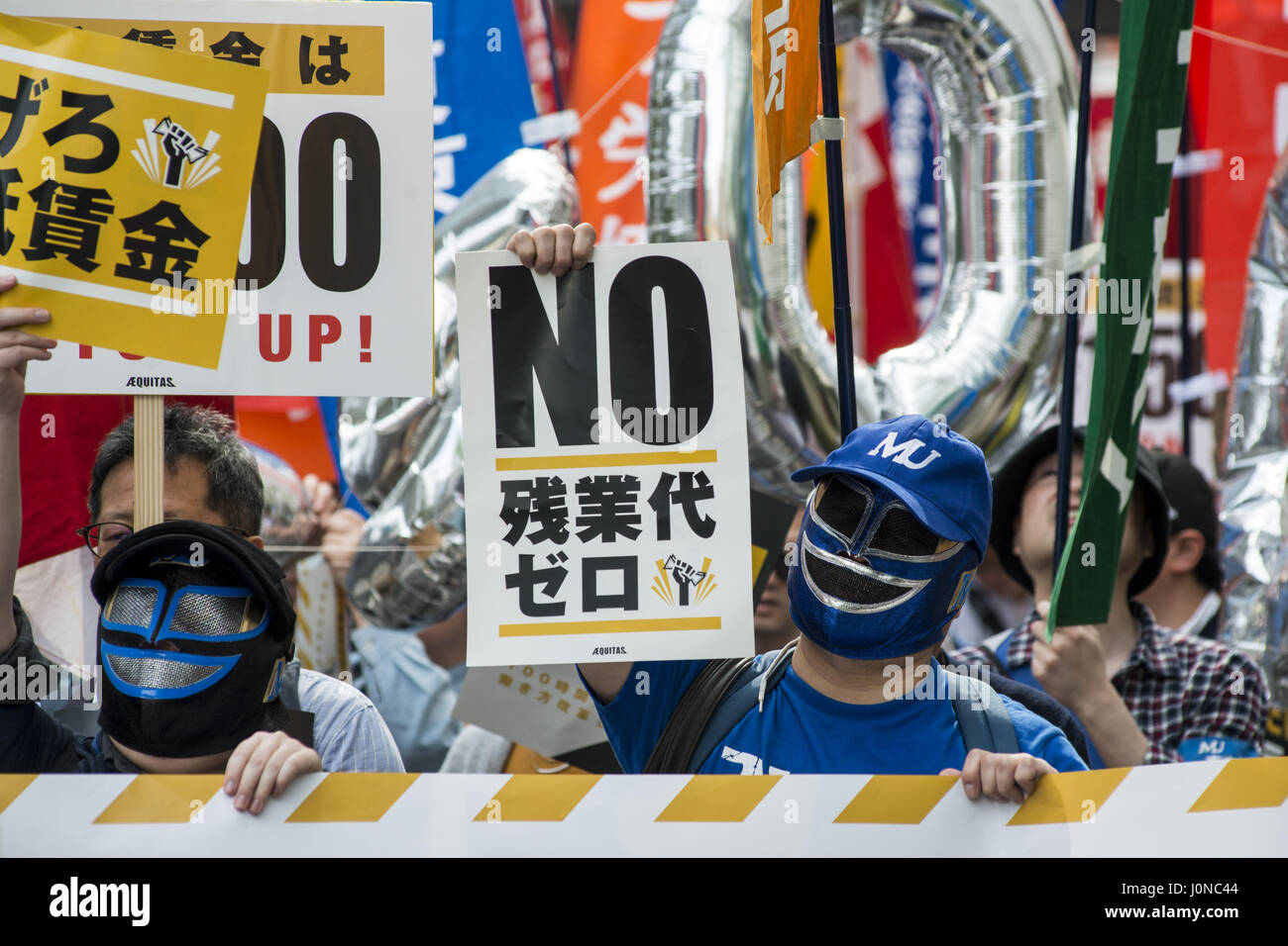Tokyo, Tokyo, Japan. 15th Apr, 2017. Protesters carrying signs and ...