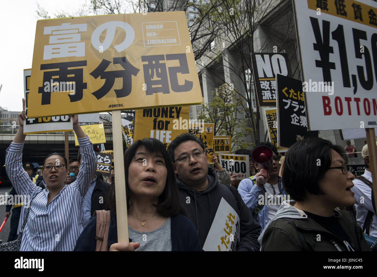 Tokyo, Tokyo, Japan. 15th Apr, 2017. Protesters carrying signs and ...