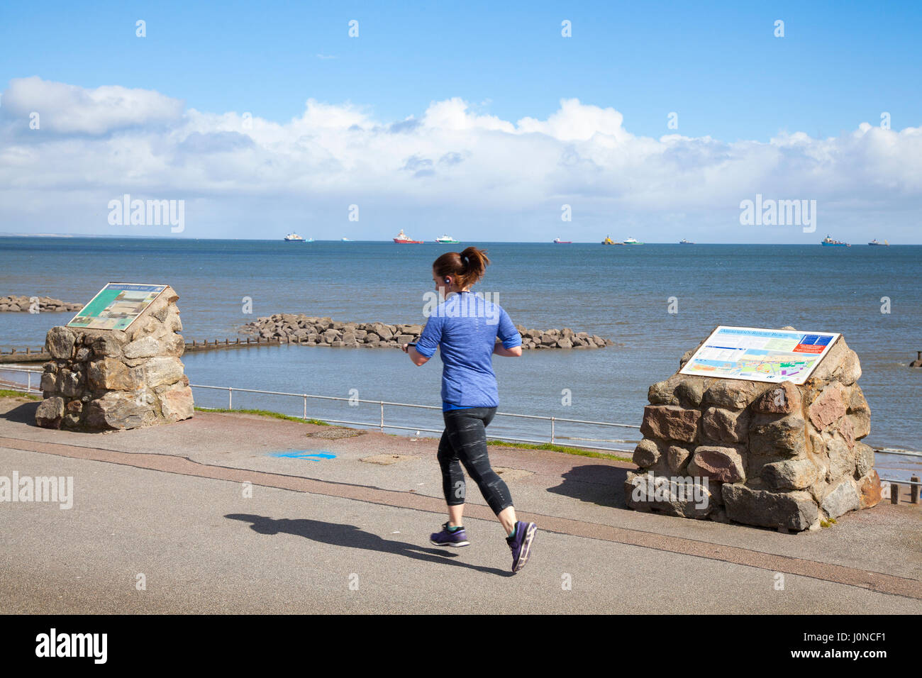 People on the Scottish Seafront promenade esplanade in Aberdeen ...