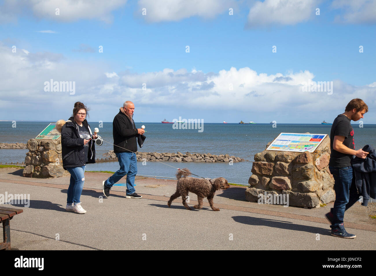 People on the Scottish Seafront promenade esplanade in Aberdeen ...