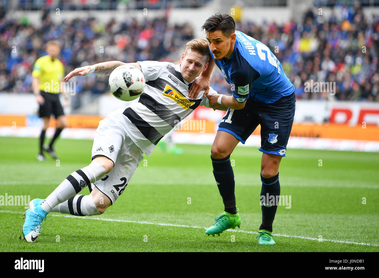 Moenchengladbach's Andre Hahn (L) and Hoffenheim's Benjamin Huebner vie ...