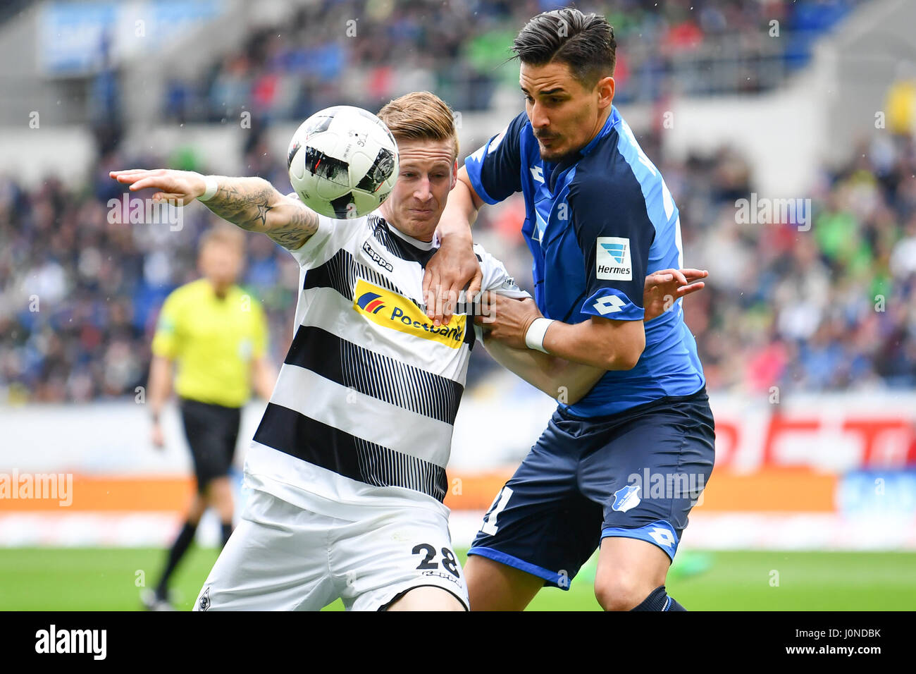 Hoffenheim's Benjamin Huebner and Moenchengladbach's Andre Hahn (L) vie ...