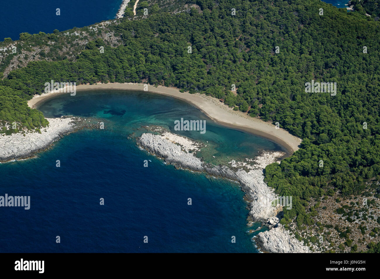 Aerial view of sandy beach Limuni on Blace Bay on Mljet Island, Croatia ...