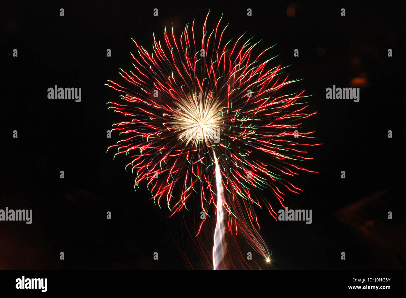 fireworks exploding in the night sky Stock Photo - Alamy
