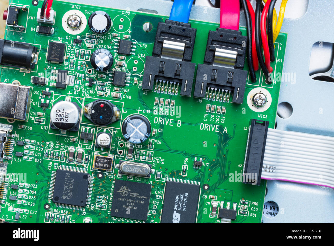 Circuit board of computer hard drive, cables, connections and terminals ...