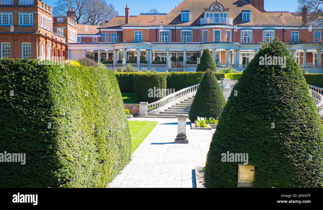 A Georgian arbour and terrace in the Hill Garden with expansive views ...