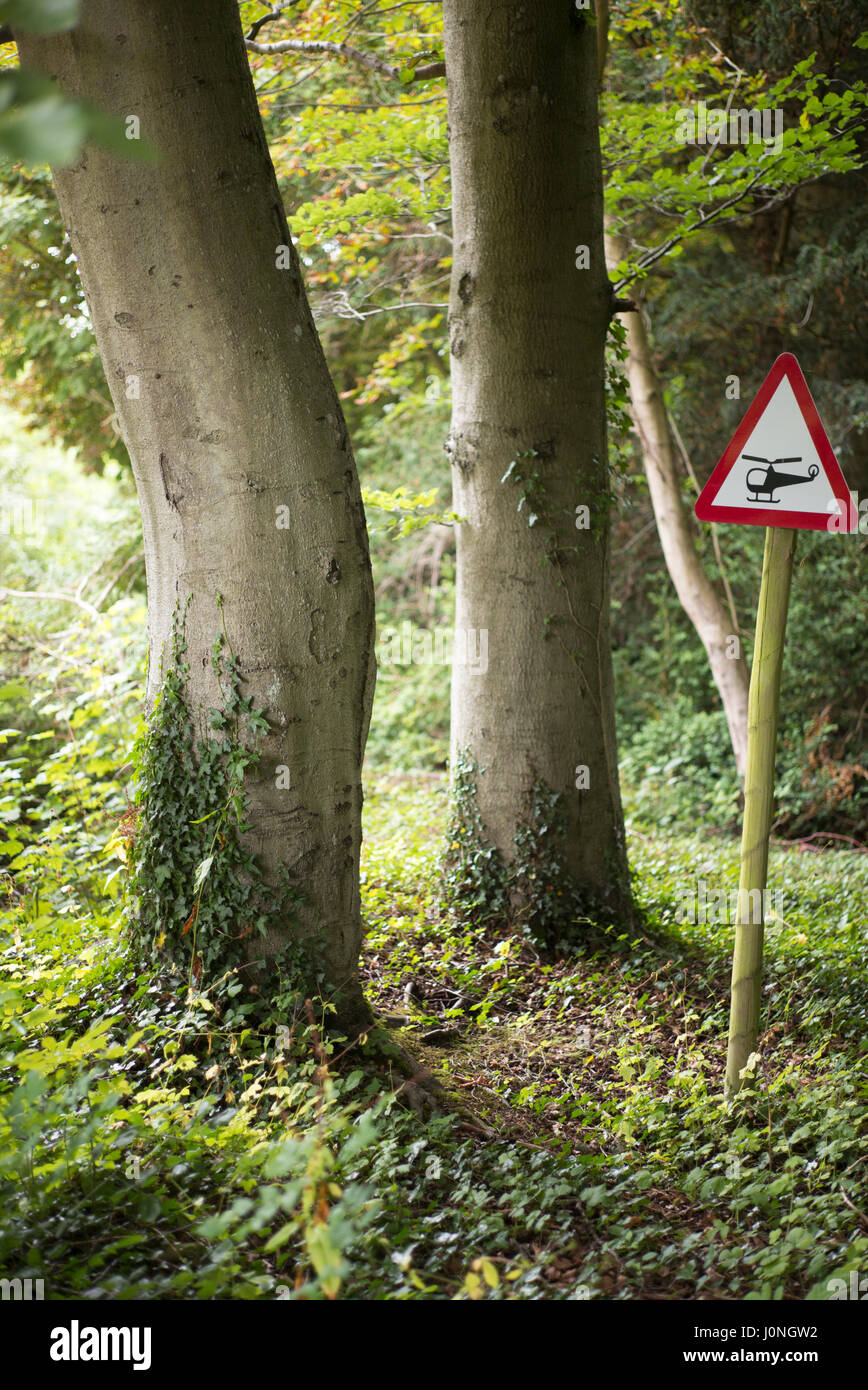 Helicopter traffic warning sign Stock Photo - Alamy