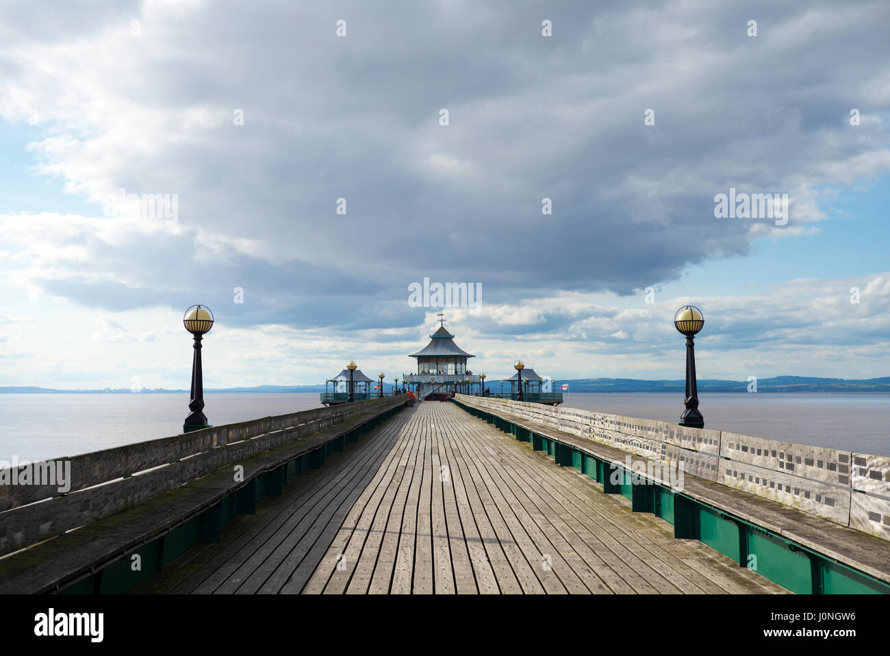 The ancient Victorian pier with timber decking on east shore of the ...