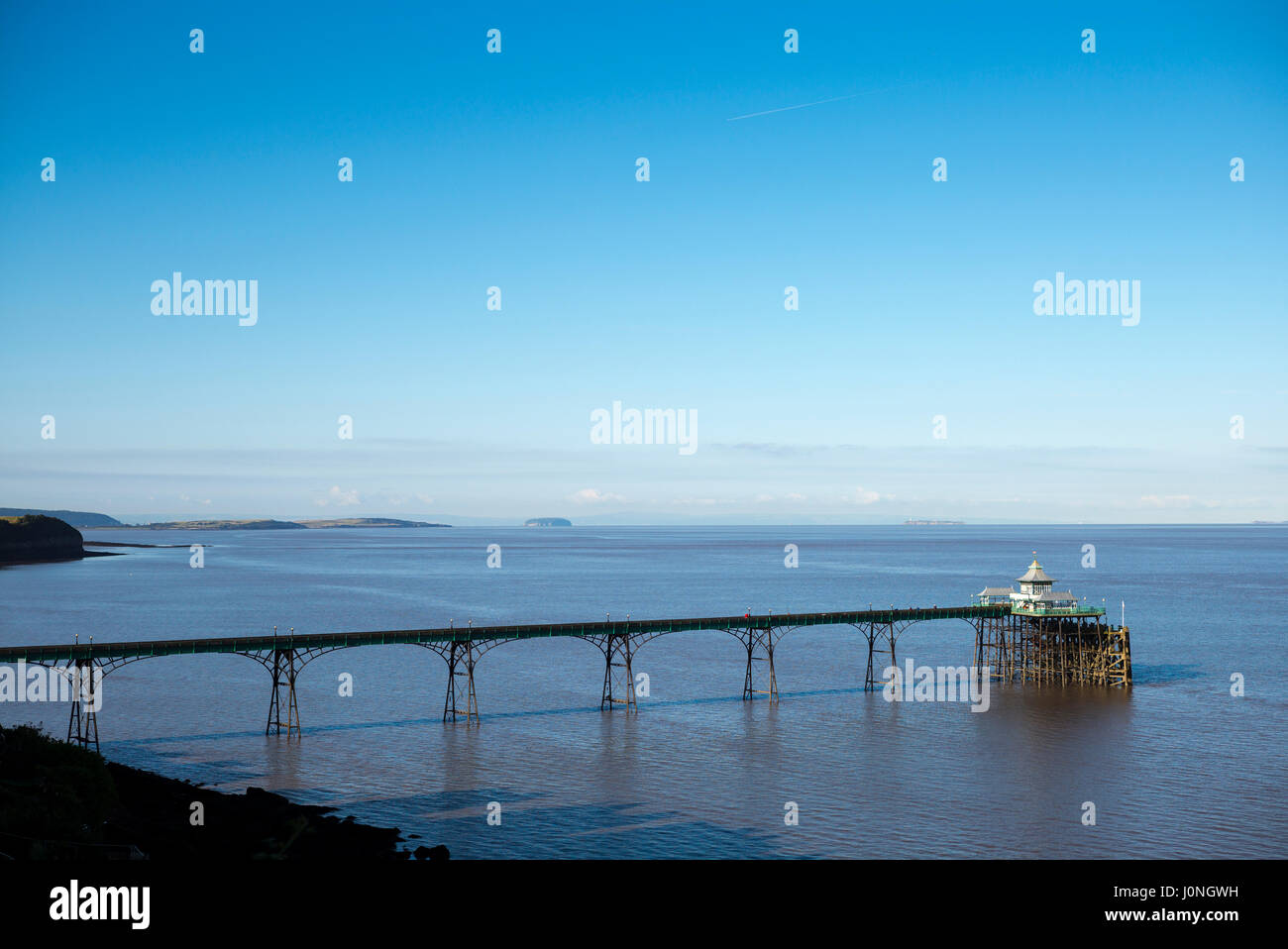The ancient Victorian pier on stilts on east shore of the Severn ...
