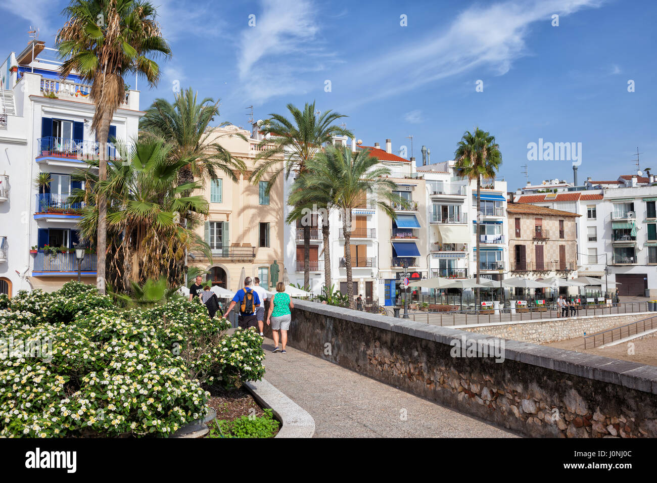 Sitges in Spain, resort coastal town, apartment houses and alley ...