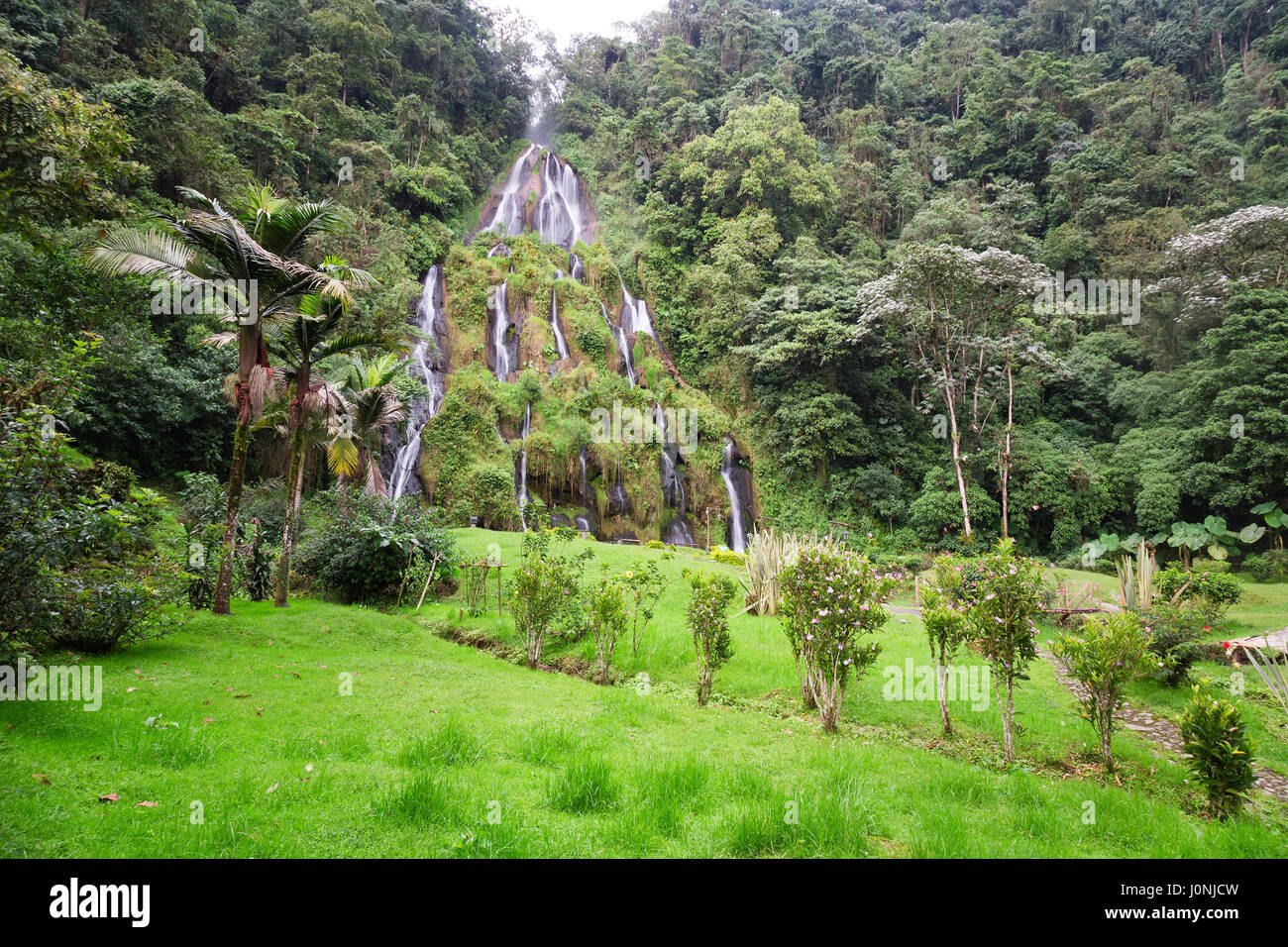 The jungle surrounds the waterfall near the Santa Rosa Thermal Spa in ...